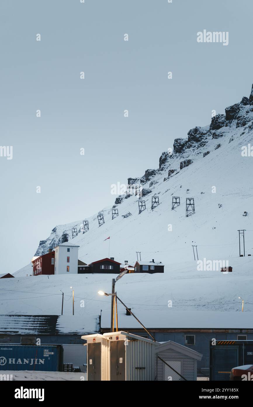 Buildings next to aerial mining tramway in Longyearbyen, Svalbard Stock ...
