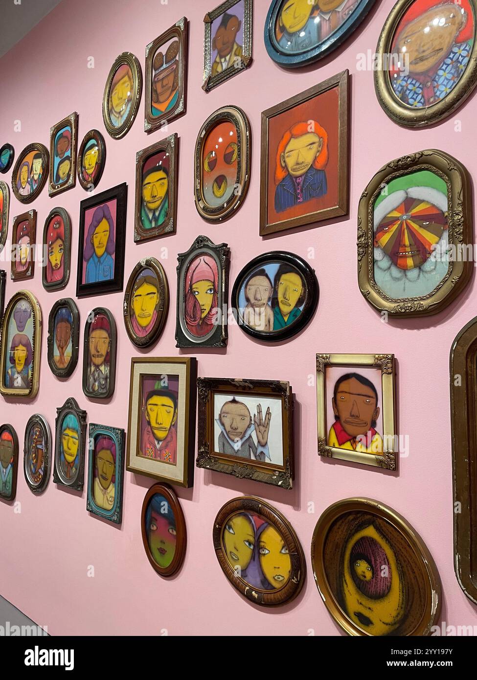 gallery wall with thought provoking illustrations of humans Stock Photo ...