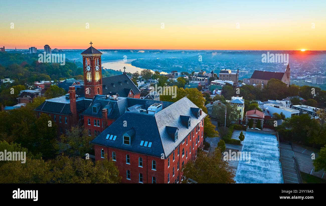 Aerial of Historic Church Clock Tower and Town at Sunrise in Cincinnati ...