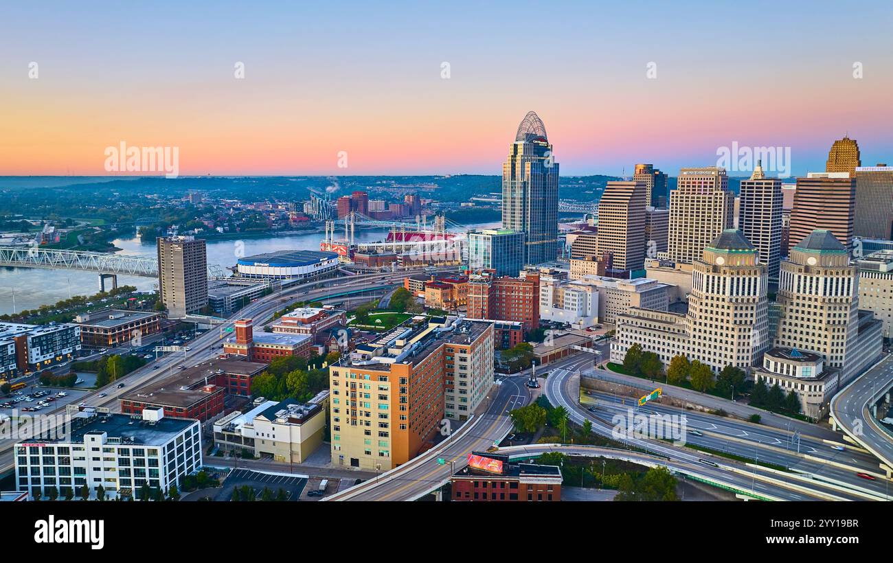 Aerial of Cincinnati Skyline at Sunrise with Ohio River and Highways ...