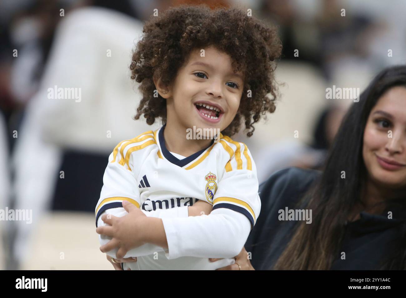 A fan of Real Madrid waits for the beginning of the Intercontinental ...
