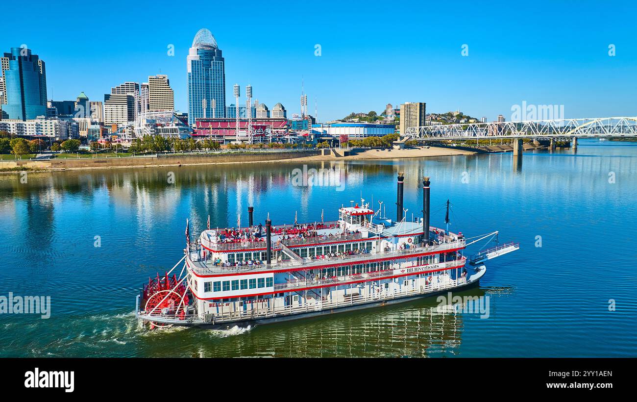Aerial of paddle wheel Riverboat and Cincinnati Skyline on Ohio River ...
