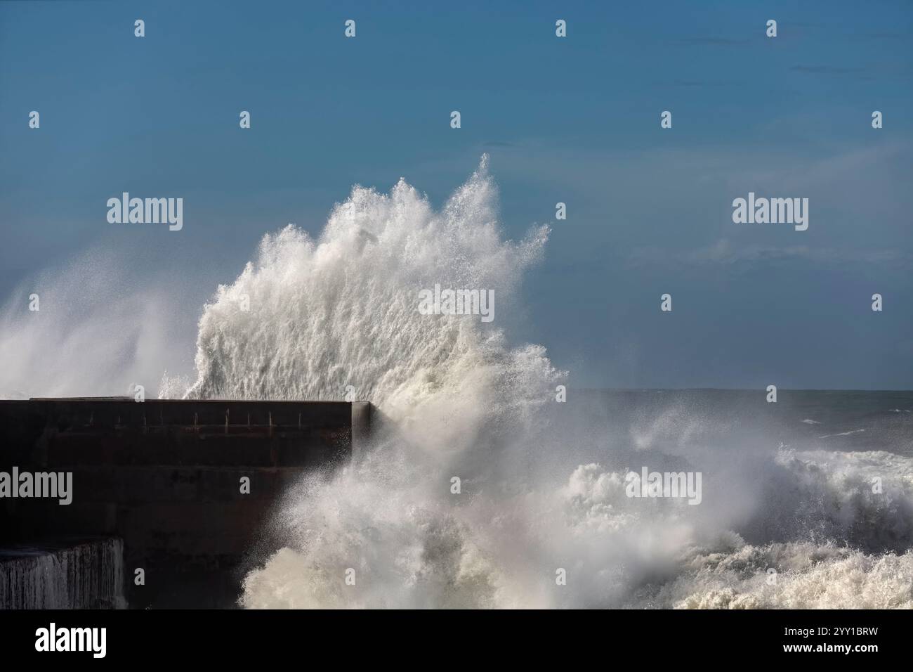 Big detailed stormy breaking sea wave splash in a sunny day. Douro ...