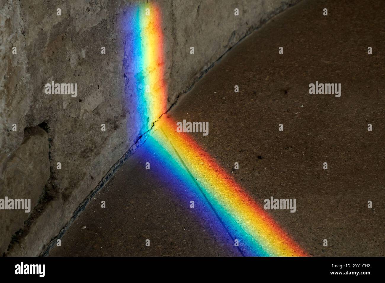 The Natural Light refraction in Rainbow inside ancient stone building ...