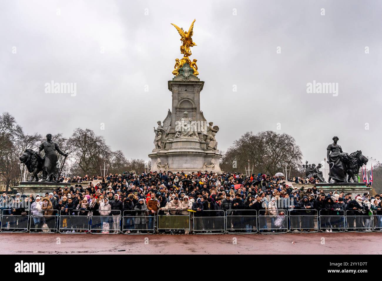 Crowds Wait Opposite Buckingham Palace At The Queen Victoria Memorial For The Start Of The ...