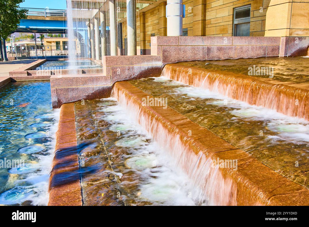 Cascading Waterfall in Urban Plaza with Modern Architecture Eye Level ...