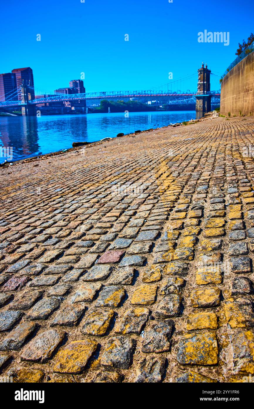 John A. Roebling Bridge and Cobblestone Path at Riverfront Low ...