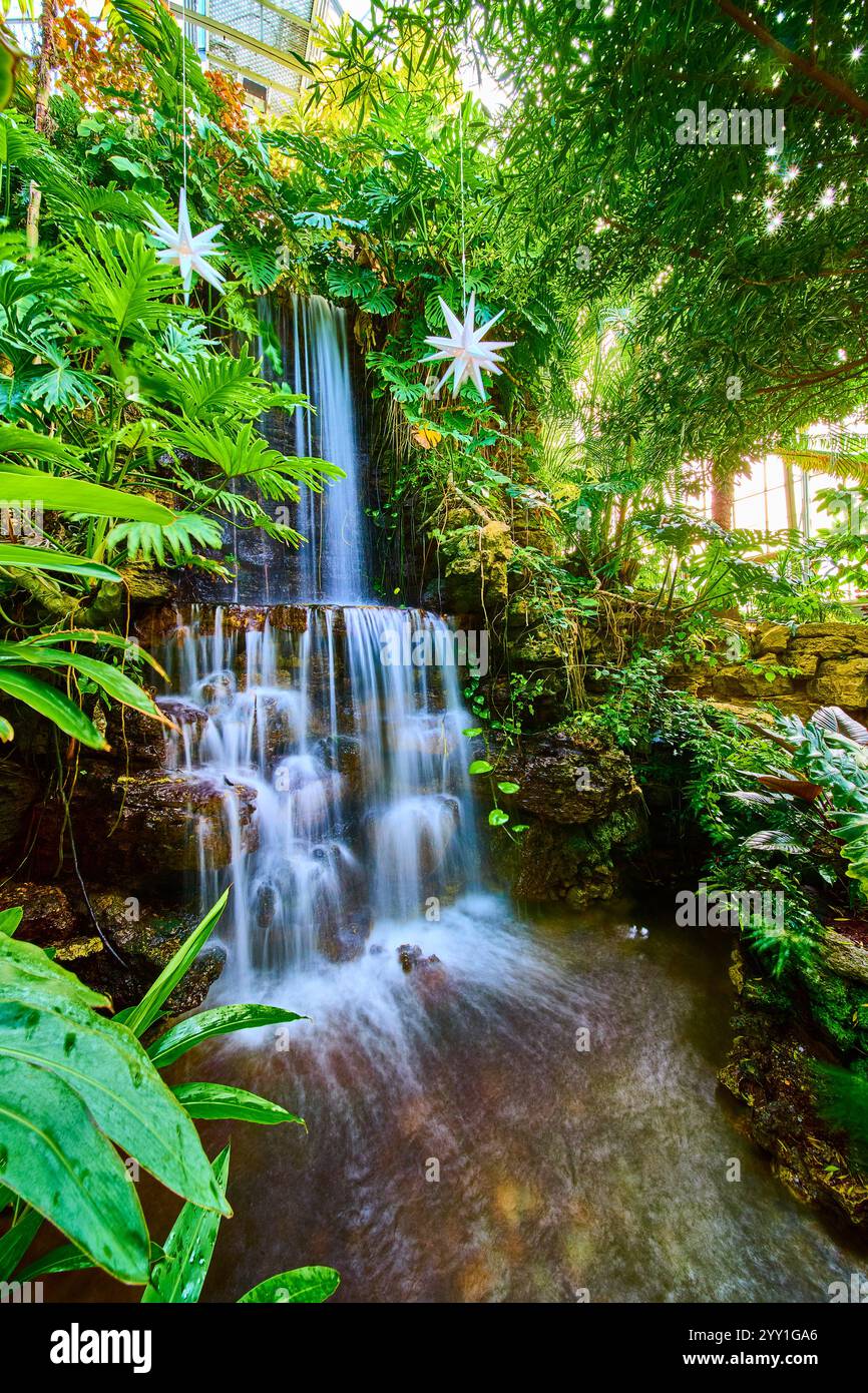 Indoor Waterfall Tropical Oasis with Festive Ornaments Eye-Level View ...