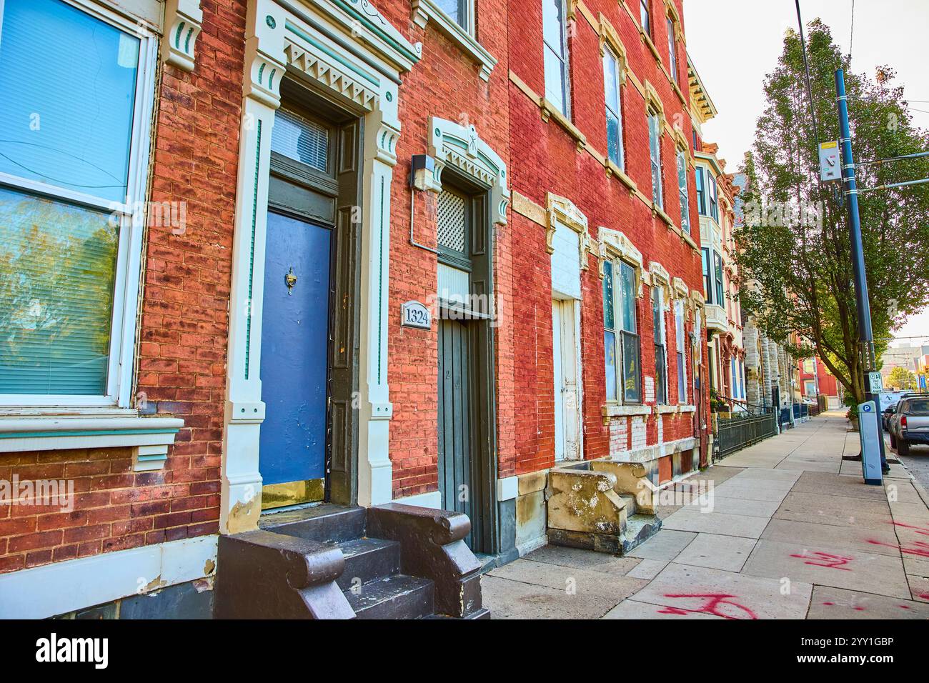 Historic Red Brick Townhouses with Blue Door in Cincinnati Street View ...