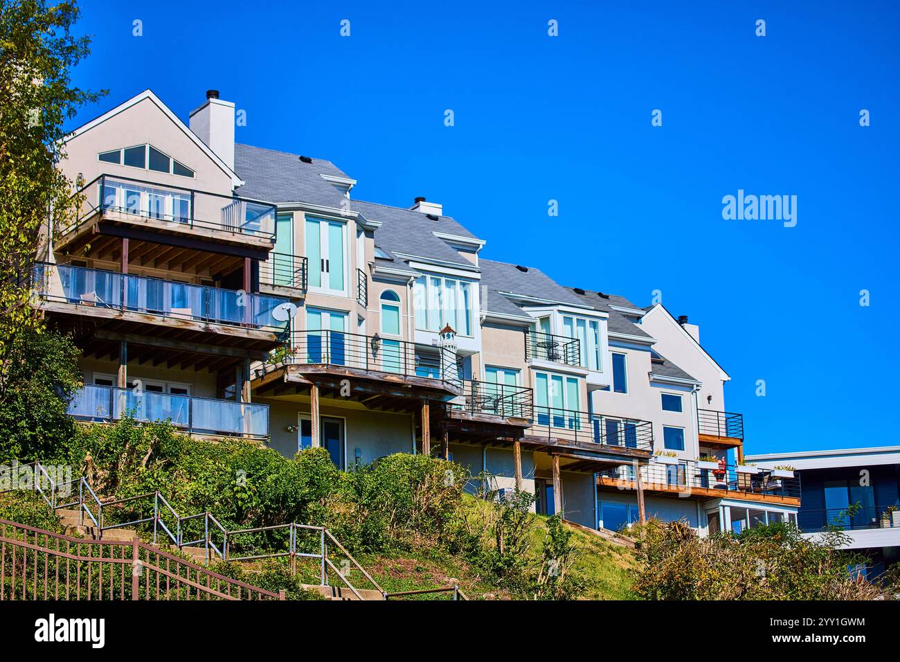 Modern Hillside Residential Complex with Glass Balconies Aerial Stock ...