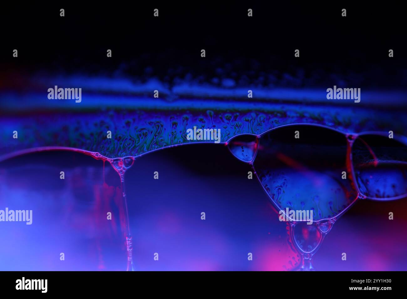 Purple liquid texture in macro, bright fluid, bubbles in macro, dark ...