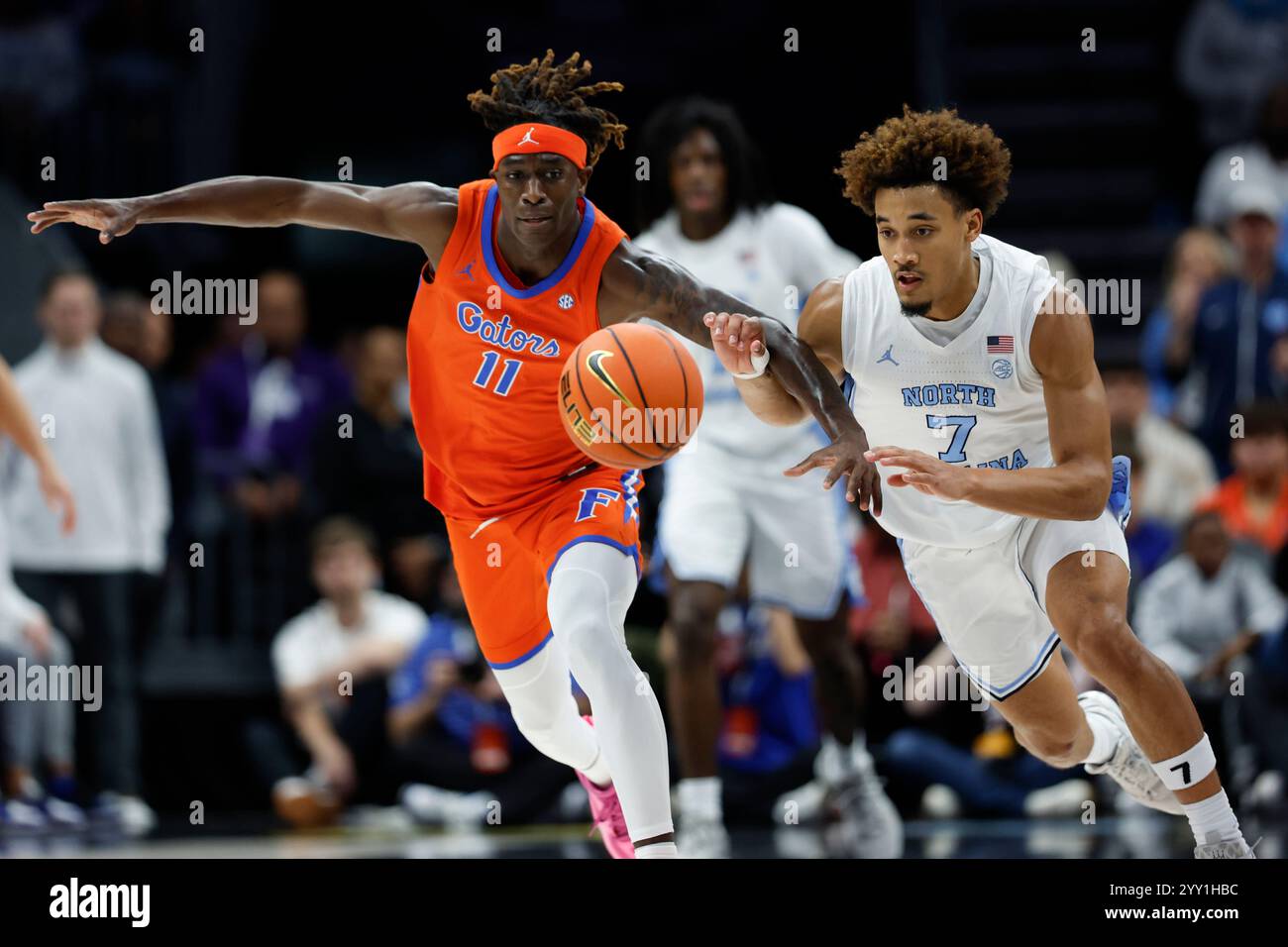 North Carolina guard Seth Trimble, right, battles Florida guard Denzel ...
