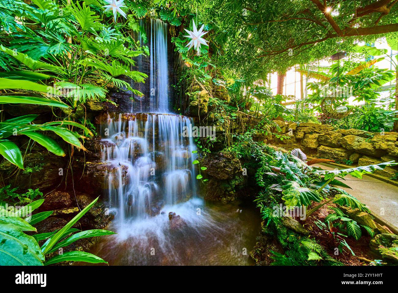 Lush Indoor Waterfall and Tropical Garden Eye-Level View Stock Photo ...