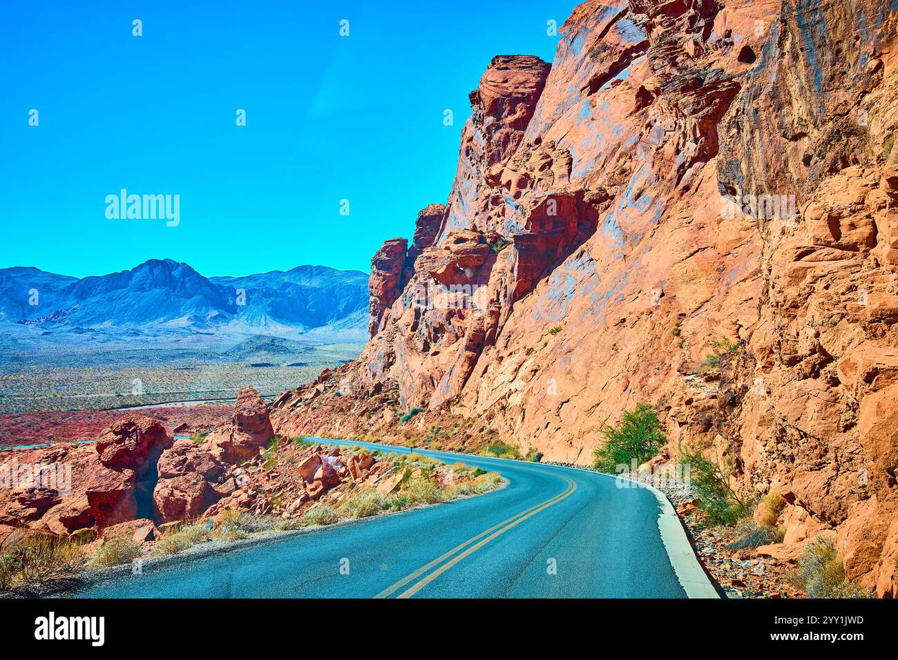 Aerial through desert valley winding hi-res stock photography and ...