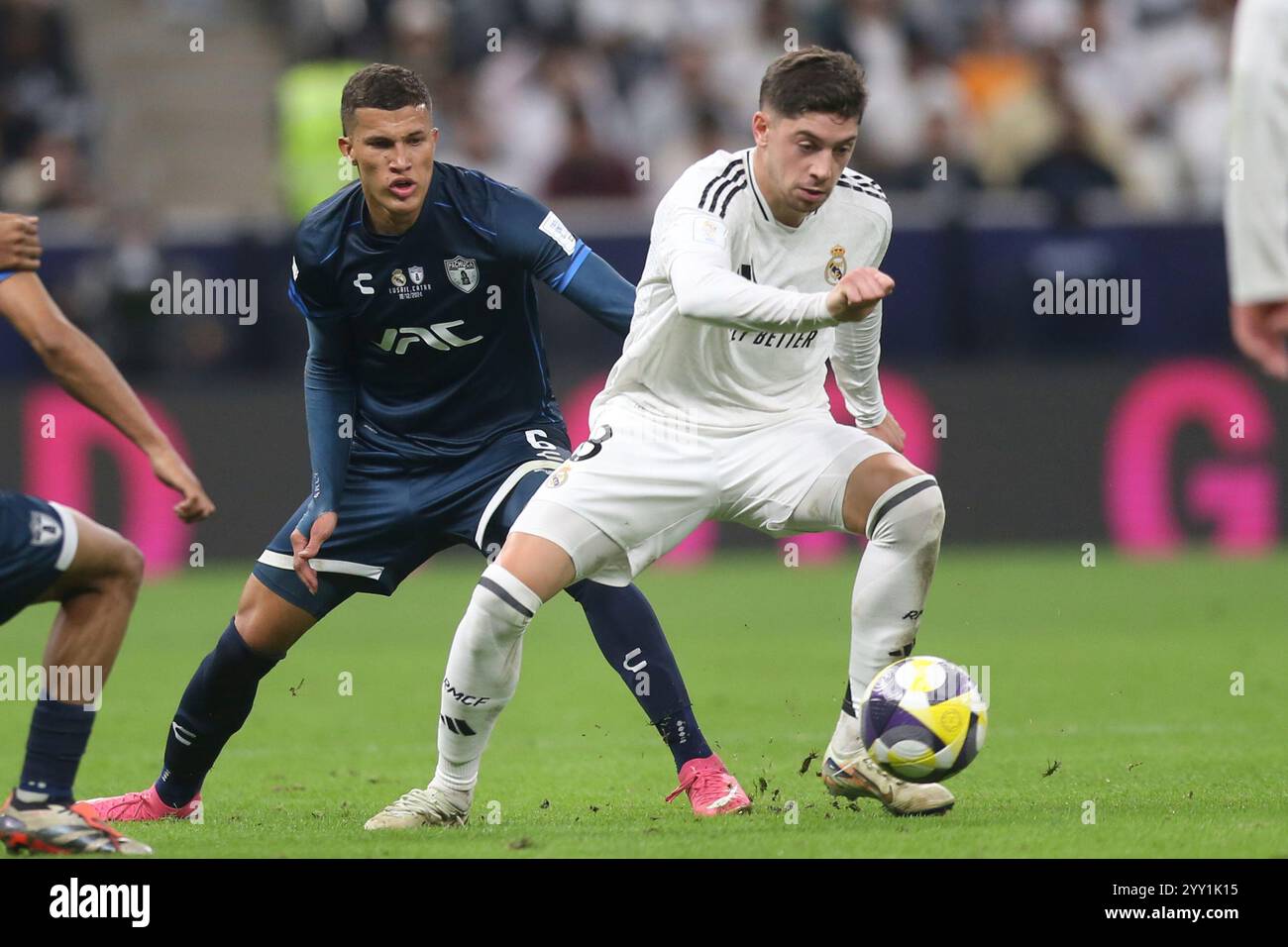 Real Madrid's Federico Valverde, right, and CF Pachuca's Nelson Deossa ...