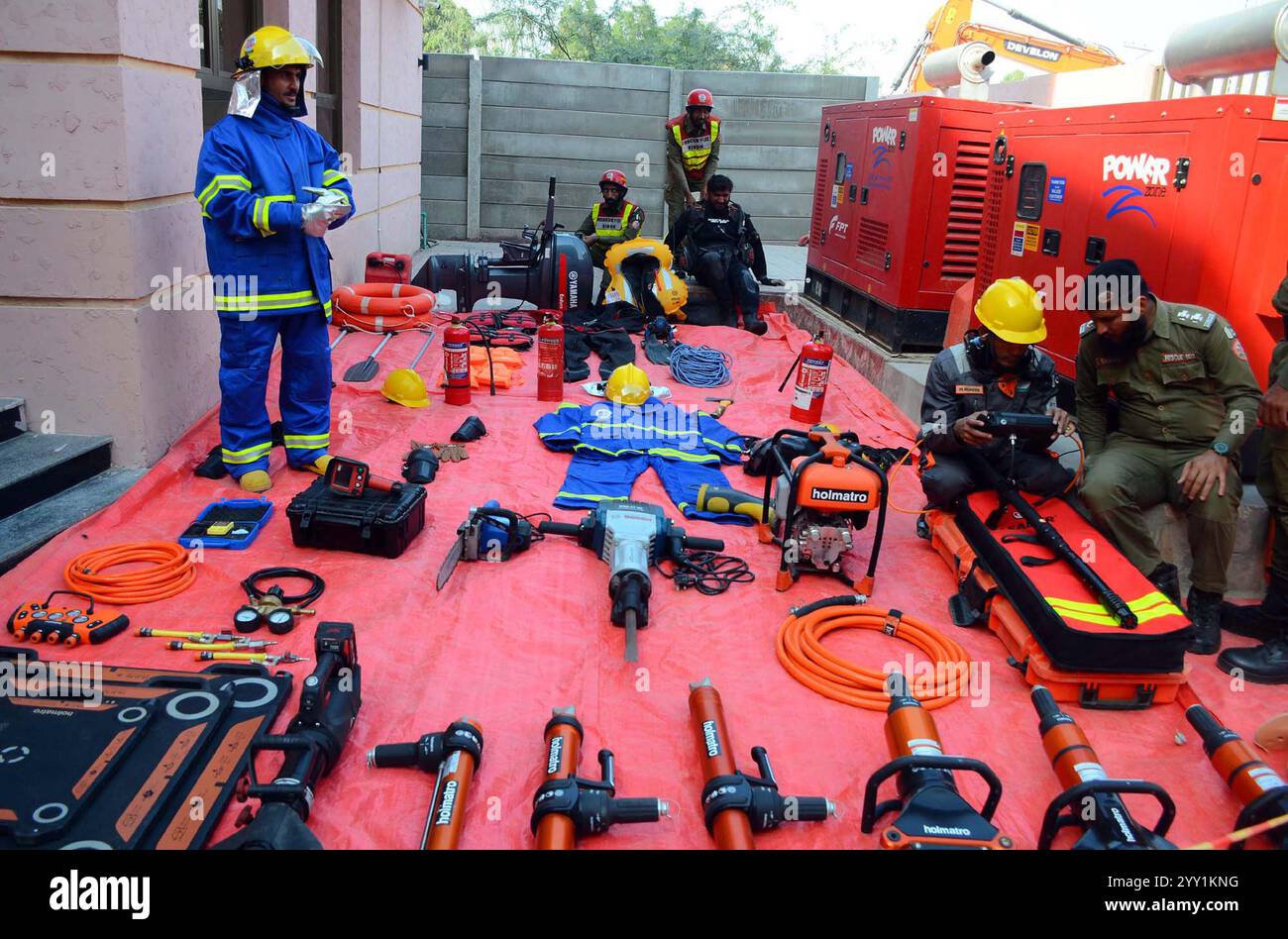 Rescue 1122 personnel are showing their rescue equipment during the ...