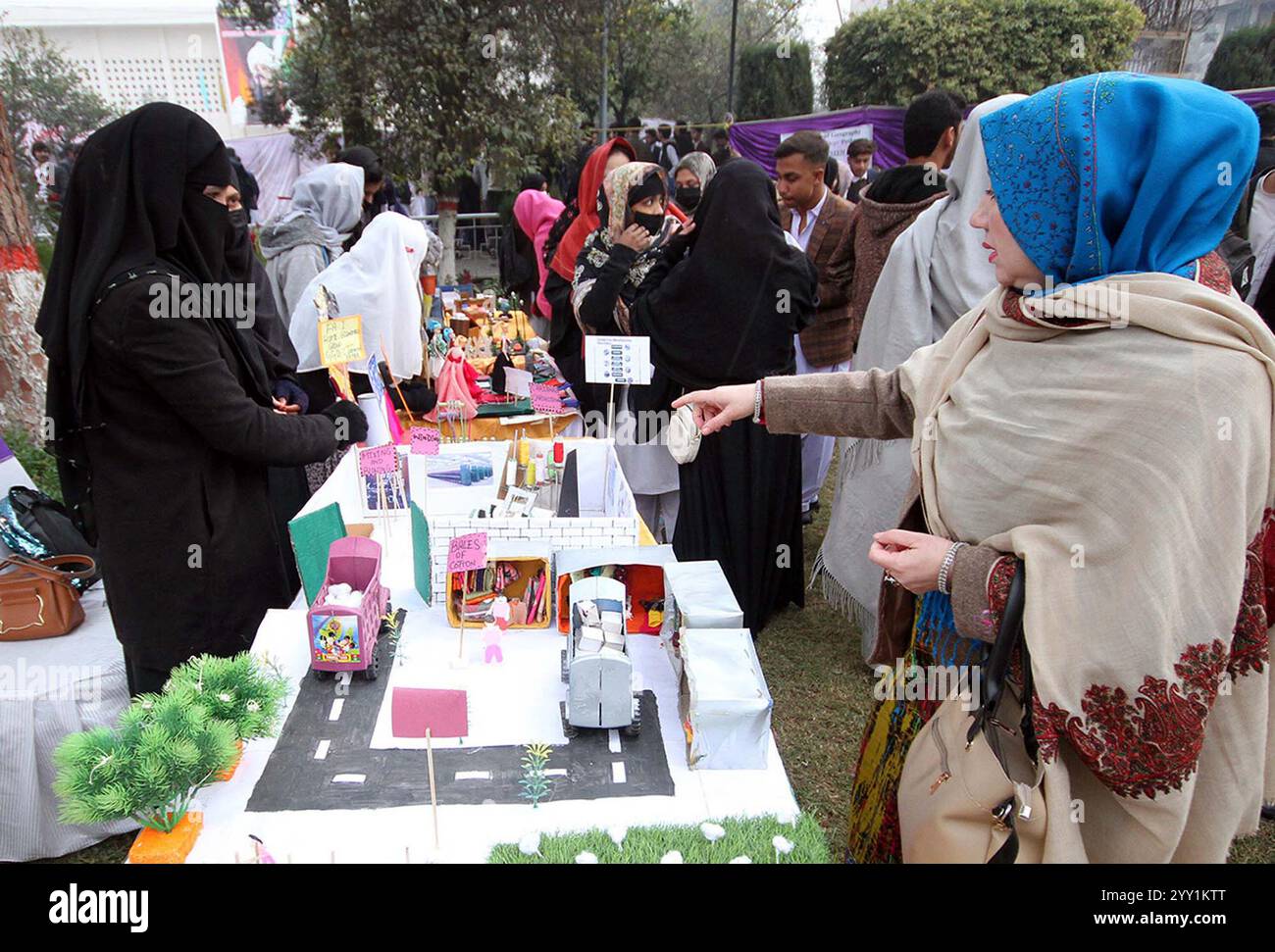 Visitors take keen interest at stalls during the Science and IT ...