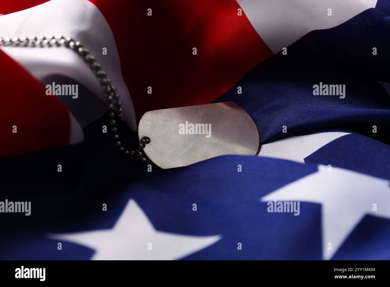 Veterans day. Army token and American flag, closeup Stock Photo - Alamy