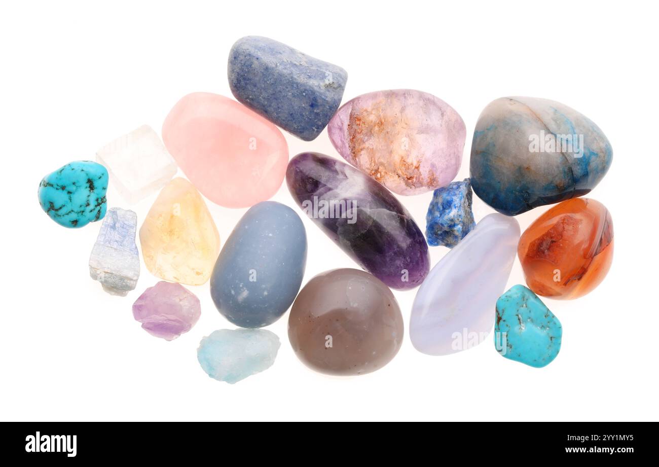 Pile of different natural mineral stones isolated on white, top view ...