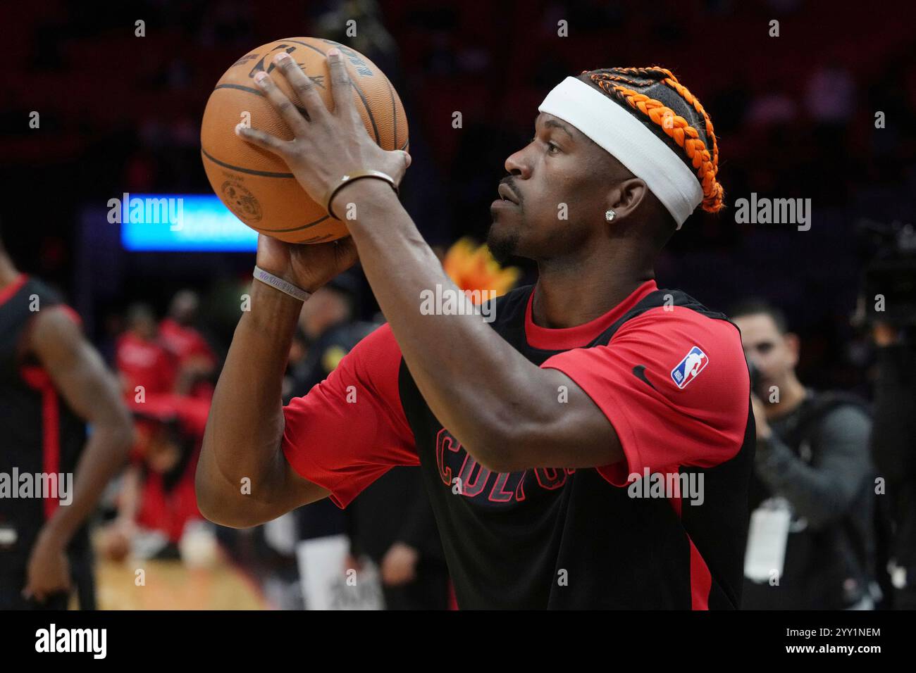 Miami Heat forward Jimmy Butler (22) warms up before an NBA basketball ...