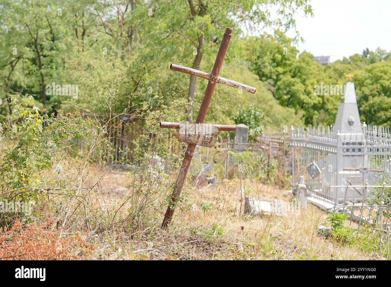 Abandoned graves in a cemetery Stock Photo - Alamy