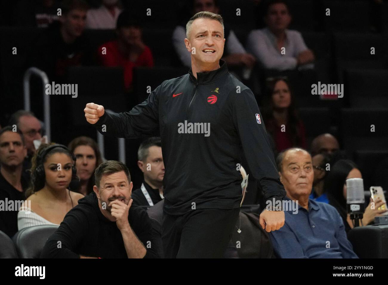 Toronto Raptors head coach Darko Rajakovic gestures during the first ...