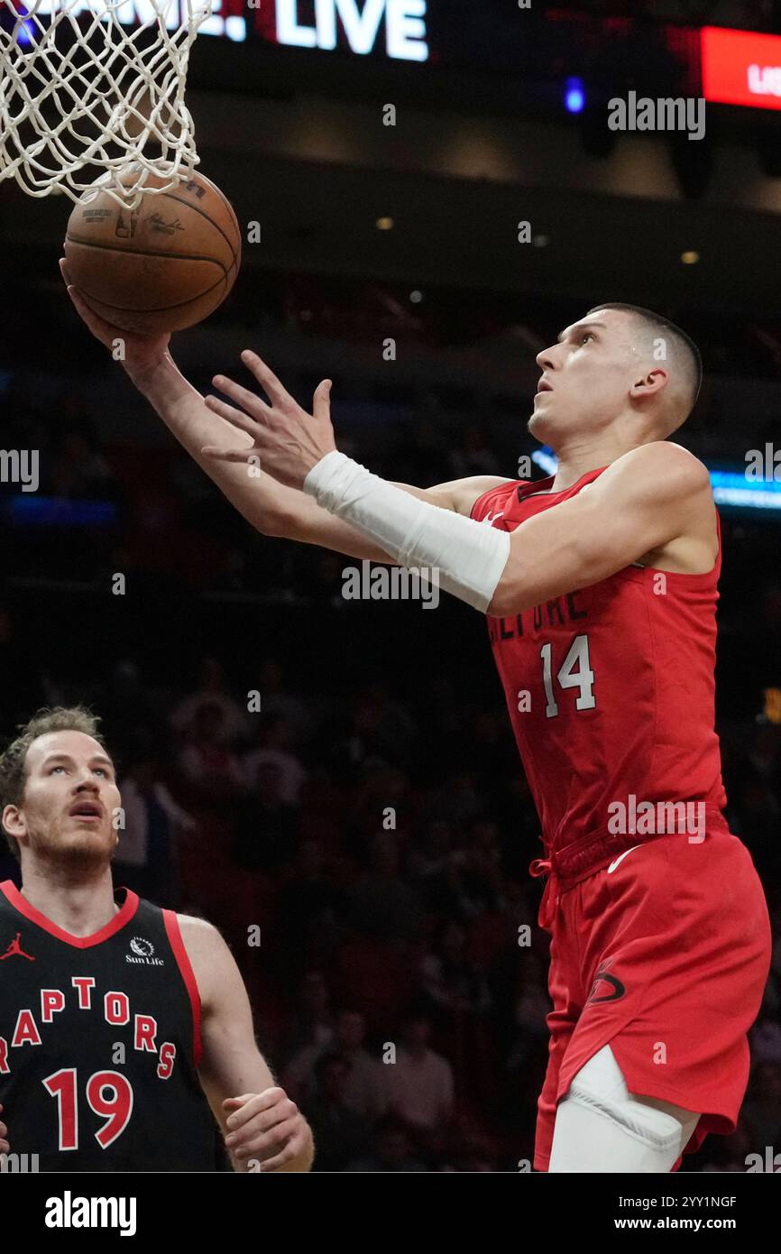 Miami Heat guard Tyler Herro (14) drives to the basket during the first ...