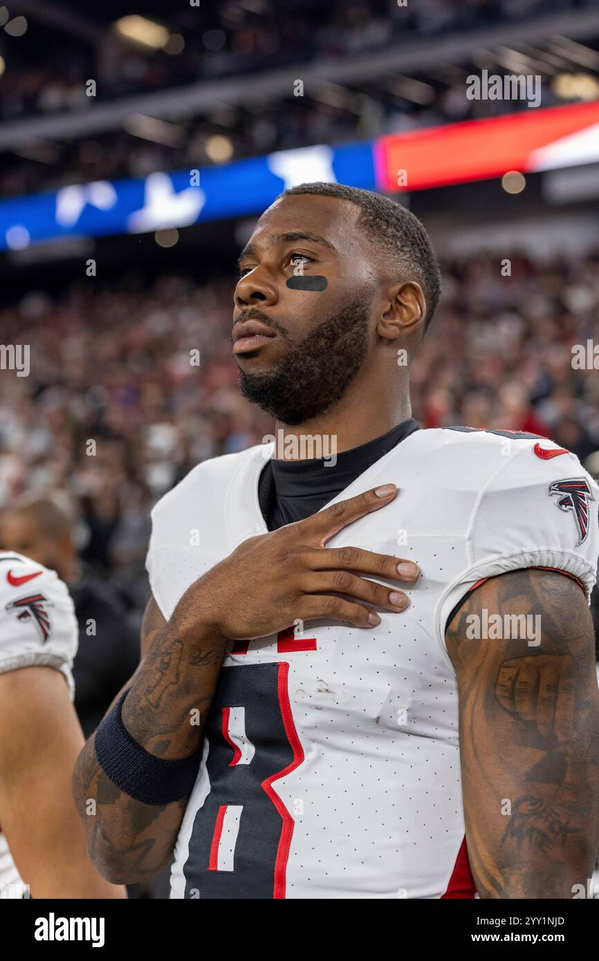 Atlanta Falcons tight end Kyle Pitts (8) stands for the national anthem ...