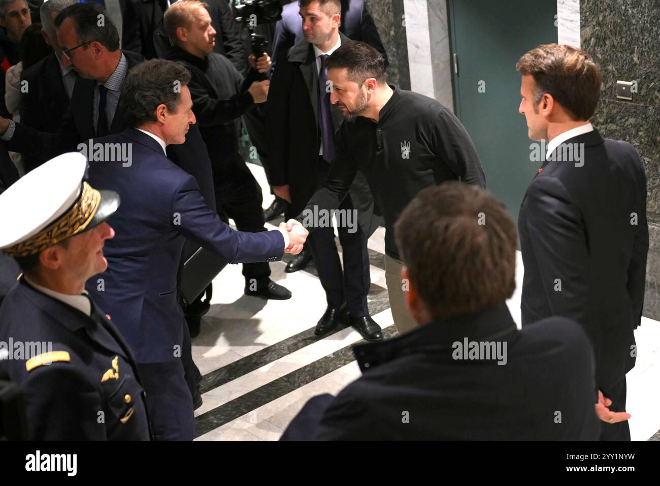 French President Emmanuel Macron, right, and Ukraine's President ...