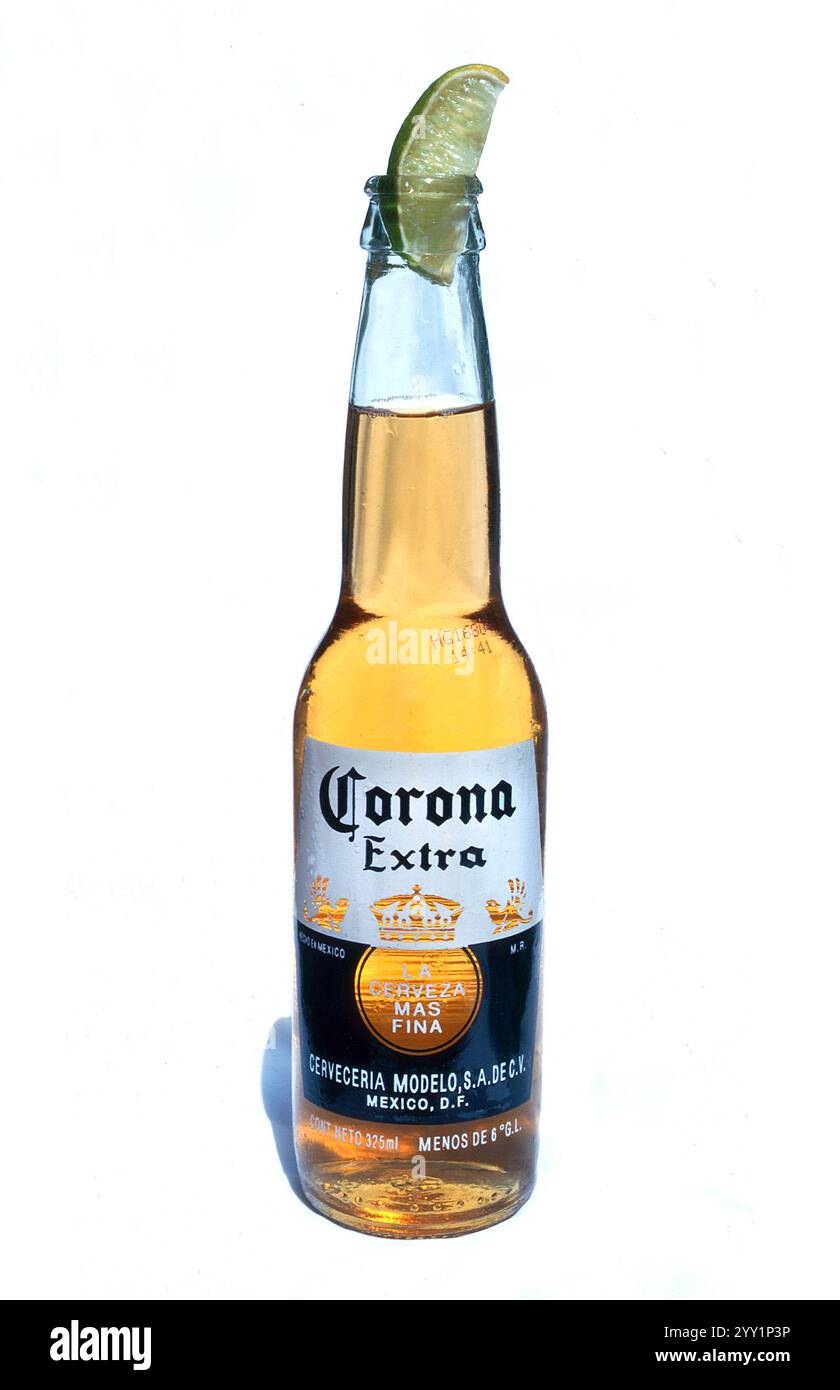 Bottle of Corona beer with lime slice Stock Photo - Alamy