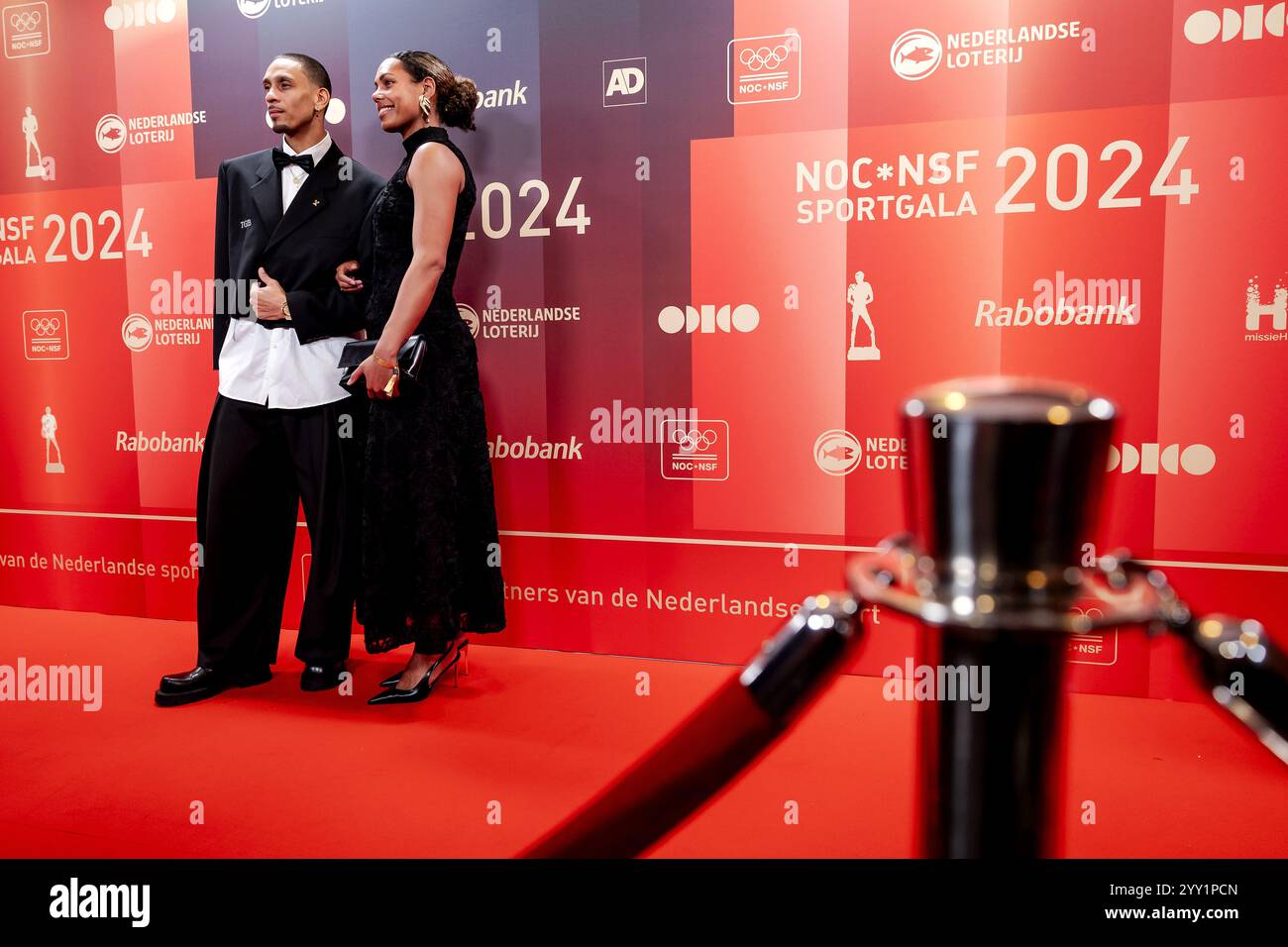 ARNHEM - Worthy de Jong with partner on the red carpet prior to the ...