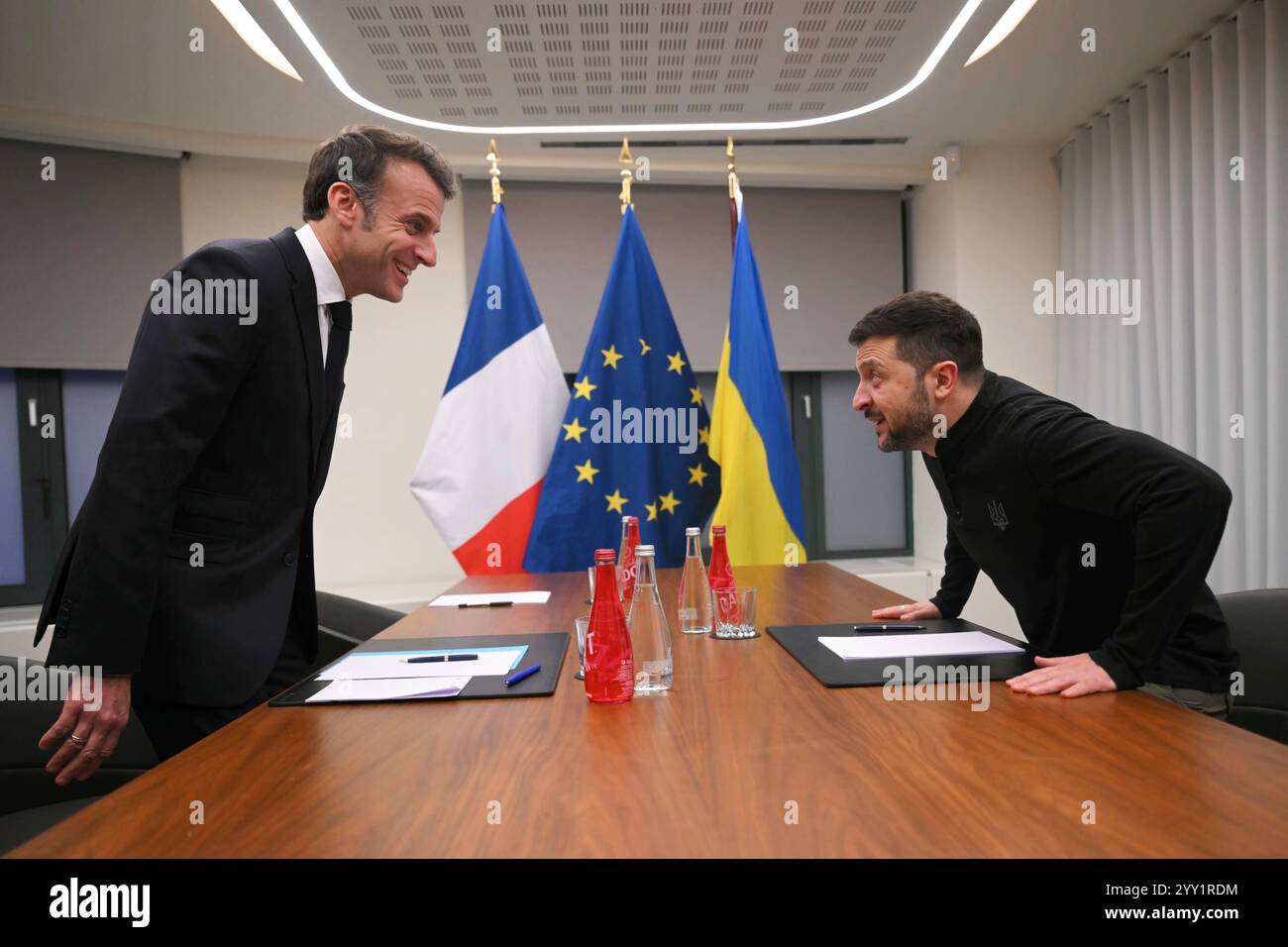 French President Emmanuel Macron, left, and Ukraine's President ...