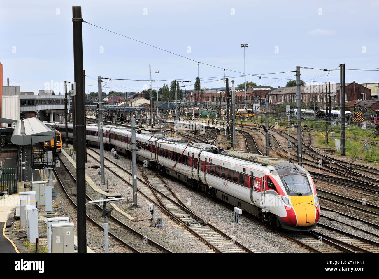 LNER Azuma train heads into Doncaster Railway Station, East Coast Main Line Railway, South ...