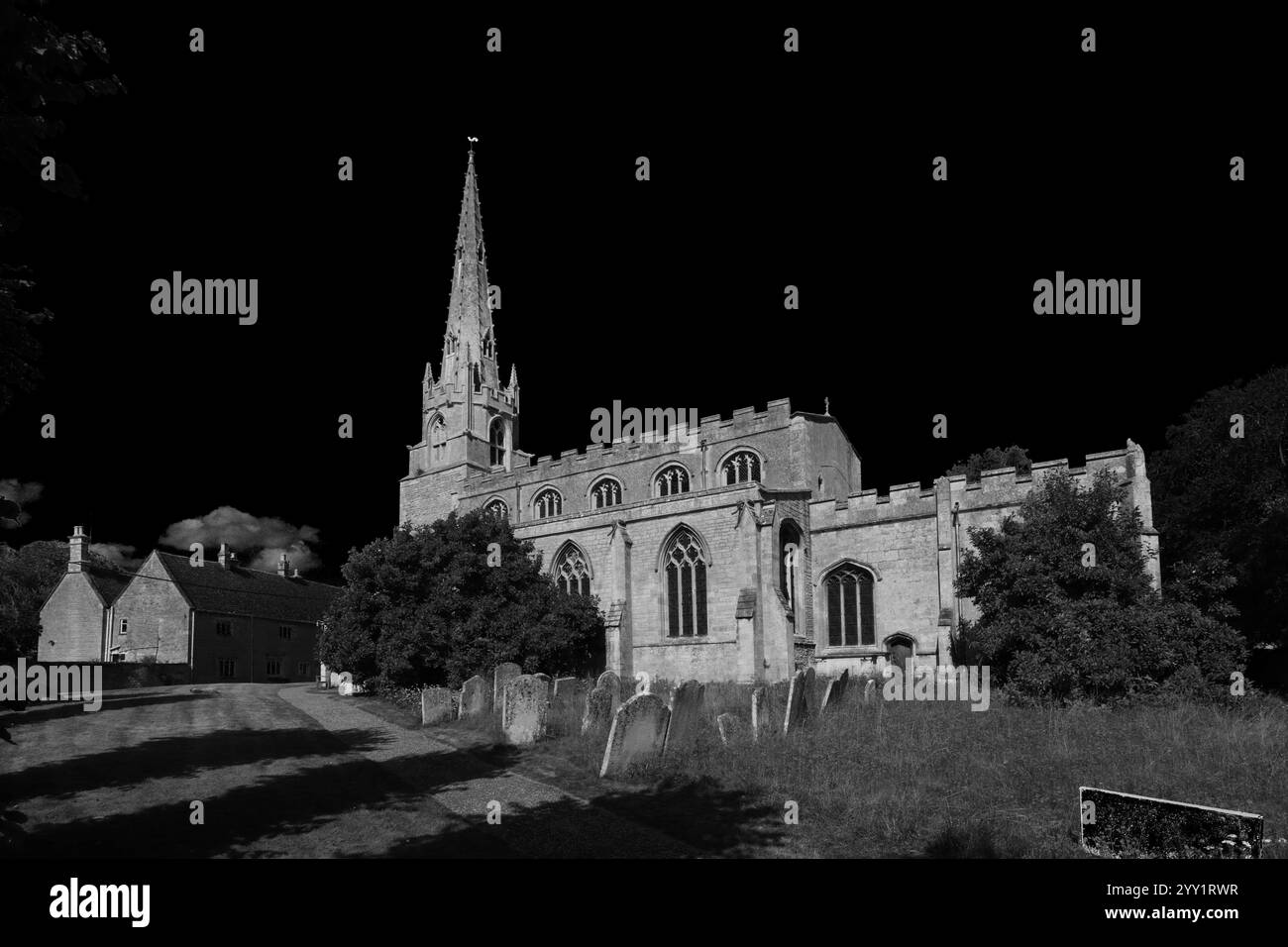 Spring view of St Marys and All Saints church, Nassington village ...