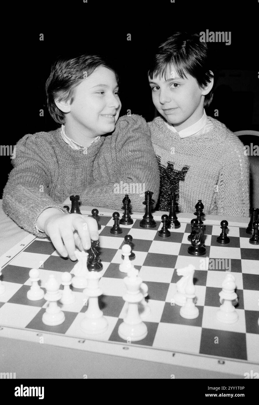 Judith Polgar 9, left and her sister Zsofia 11, pose at a chess board ...