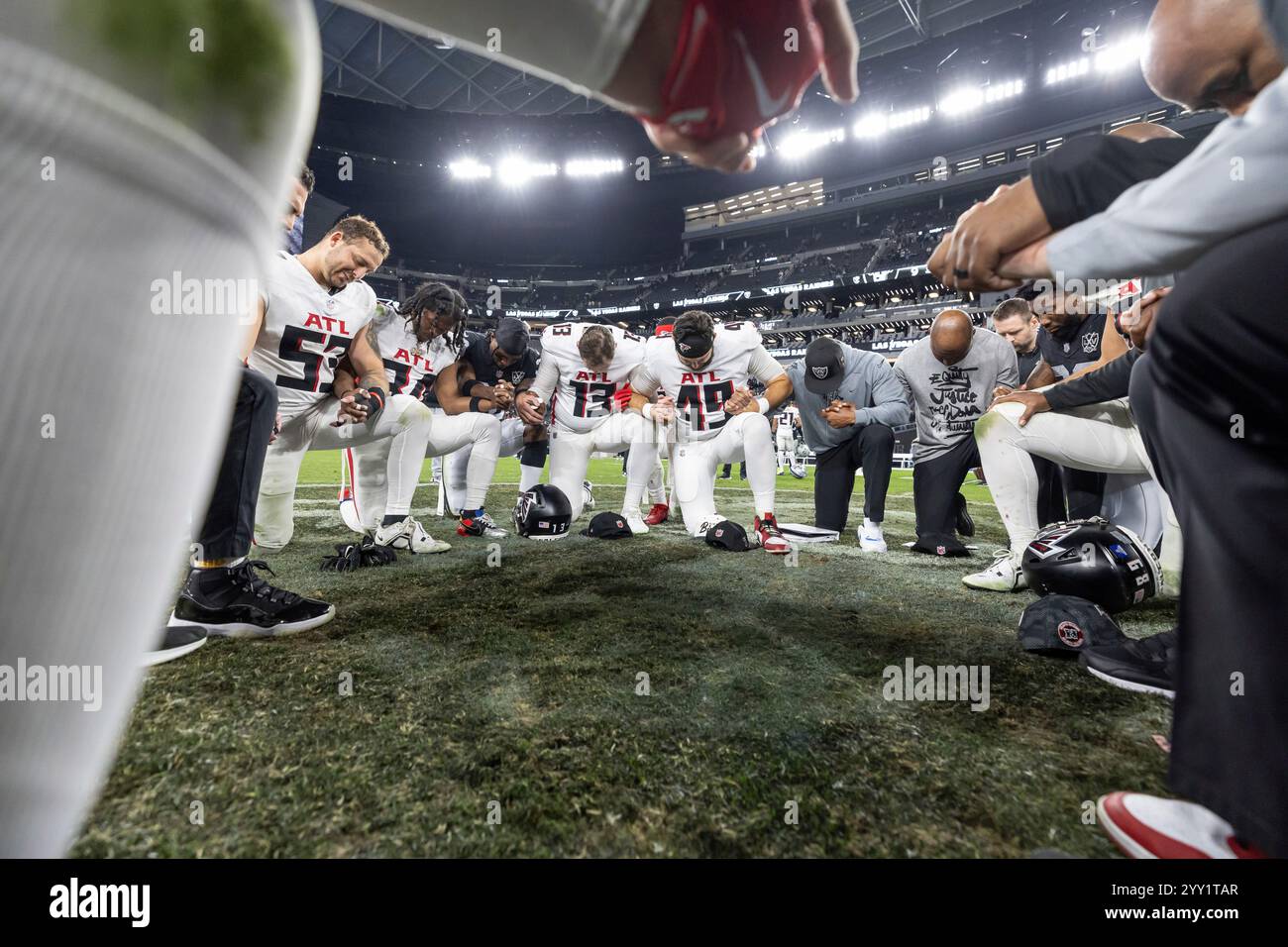 The Atlanta Falcons and Las Vegas Raiders meet on the field for a ...