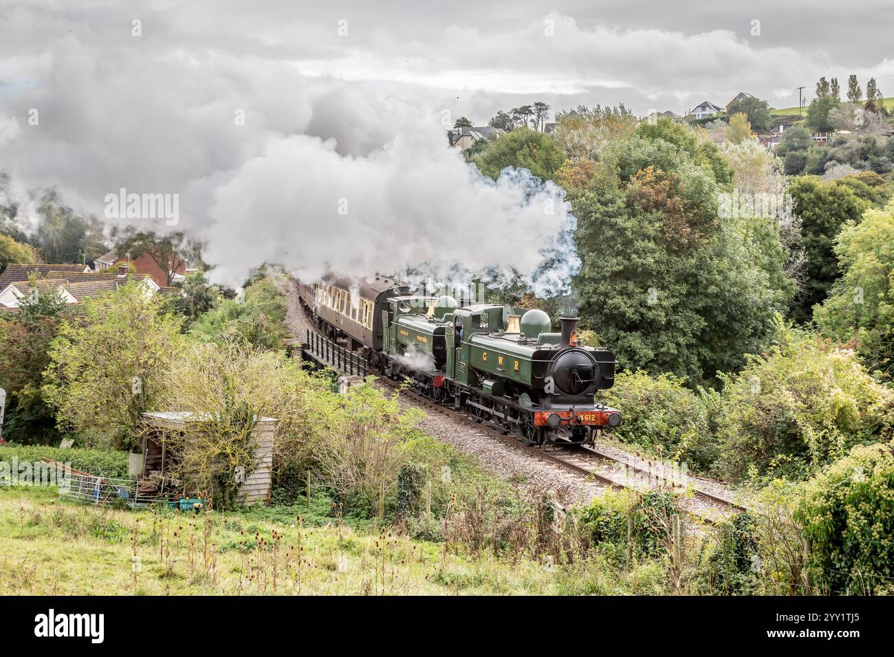 GWR '57xx' 0-6-0PT No. 4612 and No. 7752 depart from Watchet on the ...