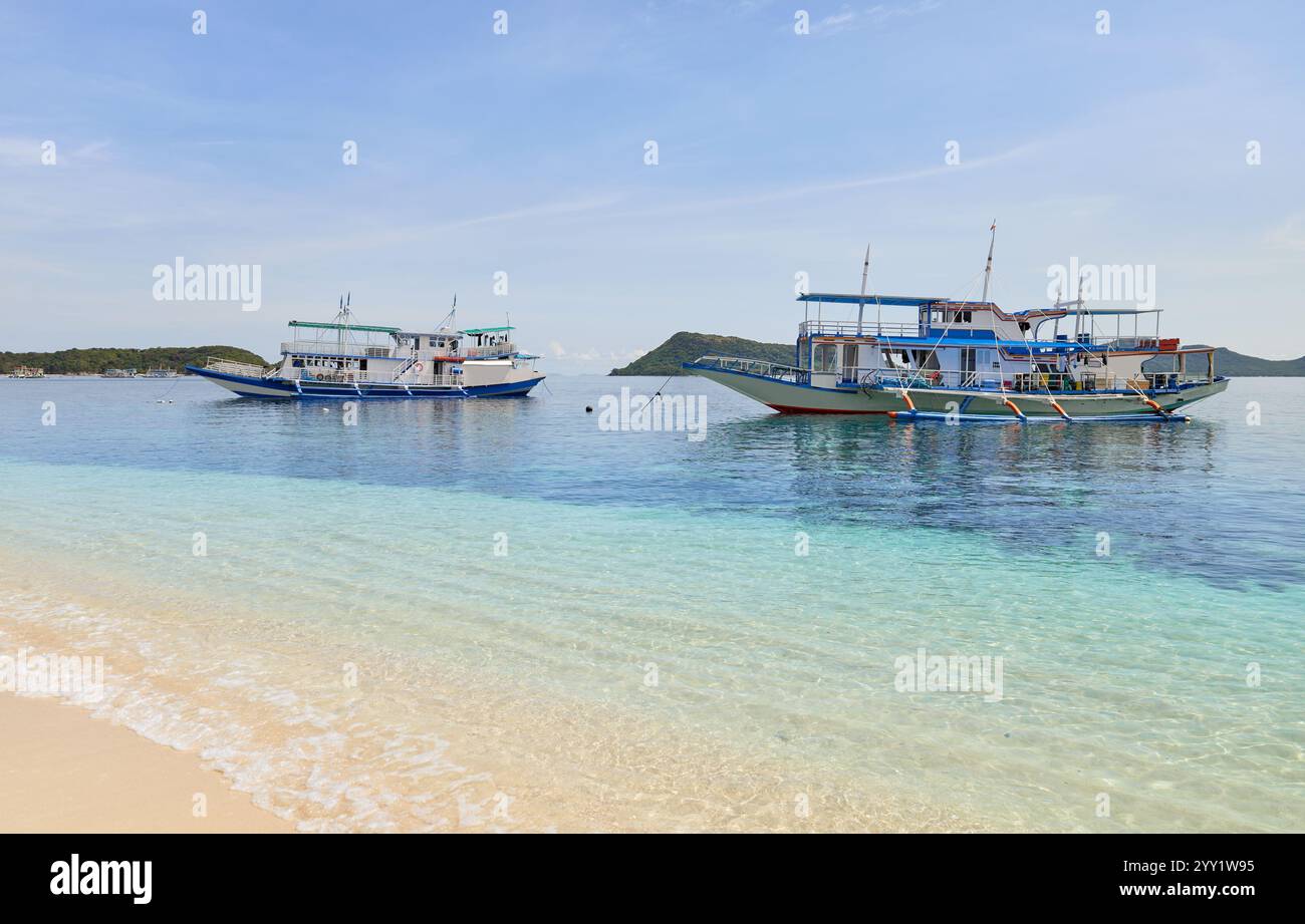 Bangka boats moored off an island in the Philippines Stock Photo - Alamy