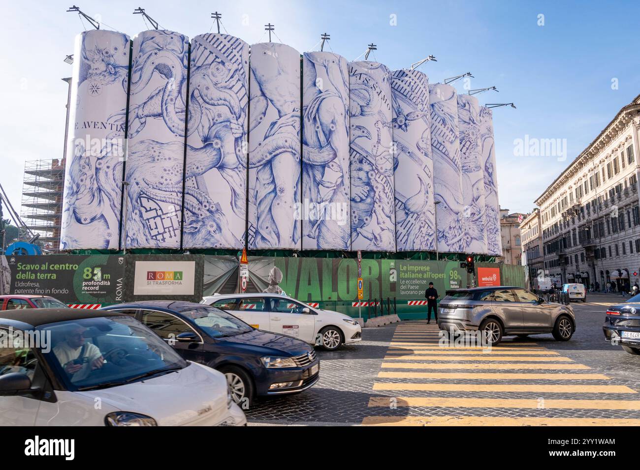 View of cars passing next to "Constellations of Rome", the title of the ...