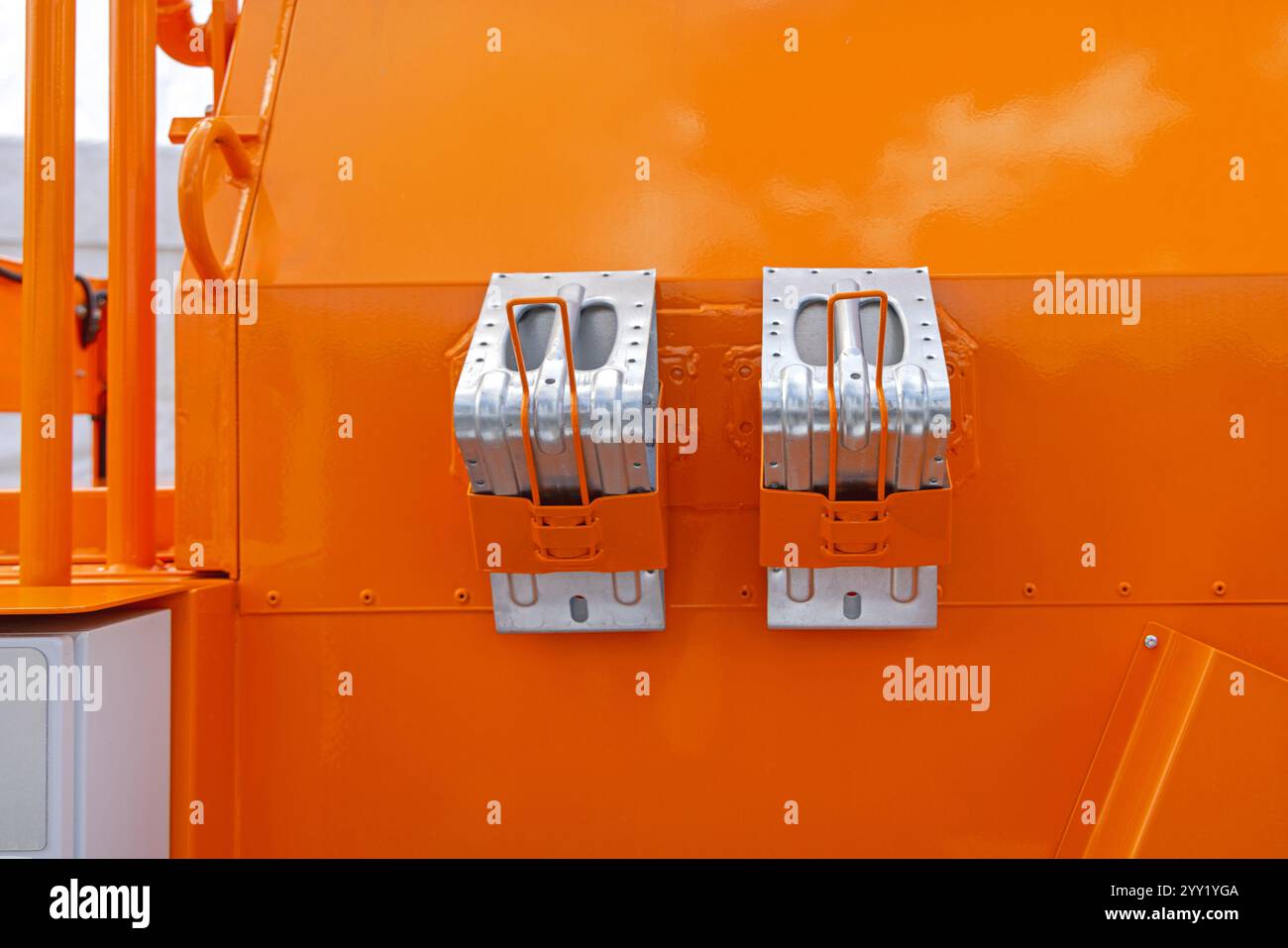 Two Wheel Chocks Metal Blocks in Holder at Orange Vehicle Stock Photo ...
