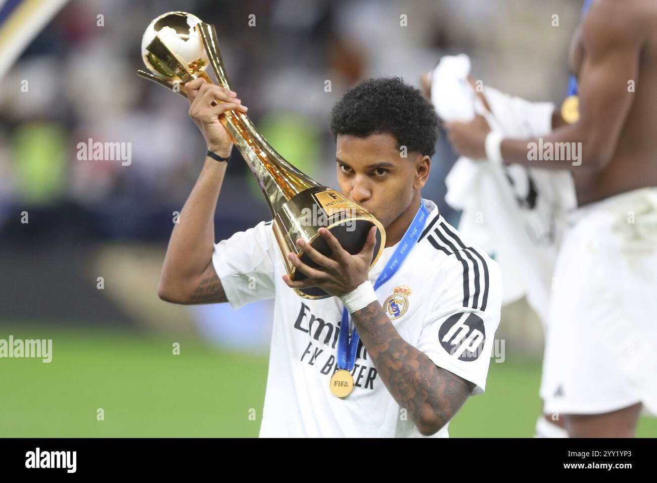 Real Madrid's Rodrygo kisses the trophy after the Intercontinental Cup ...