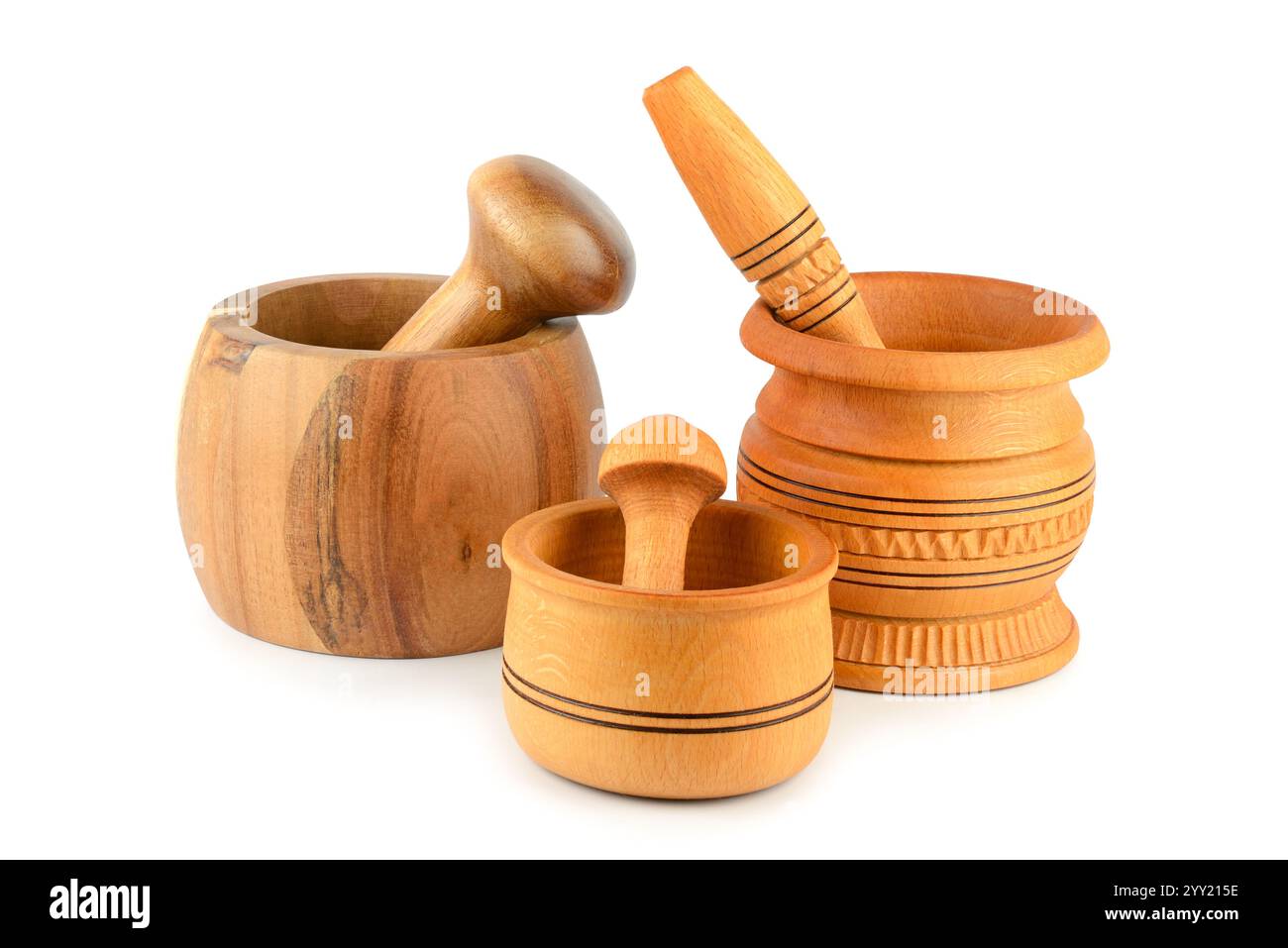 Beautiful wooden mortar and pestle isolated on white background. Side ...
