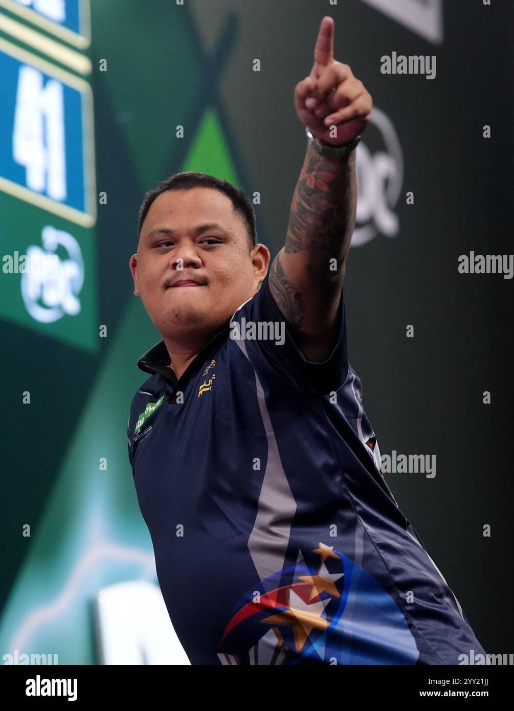 Paolo Nebrida celebrates during his first round match against Jim ...