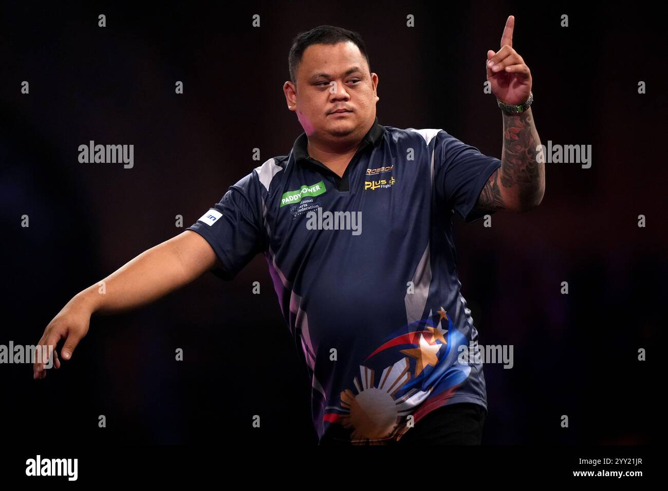 Paolo Nebrida reacts during his first round match against Jim Williams ...