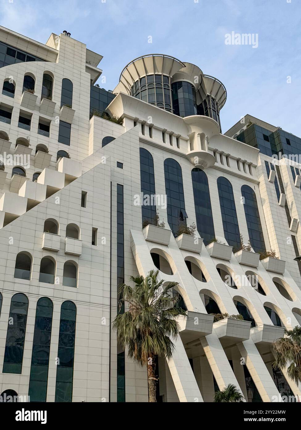 This image highlights a stunning modern building featuring elegant ...