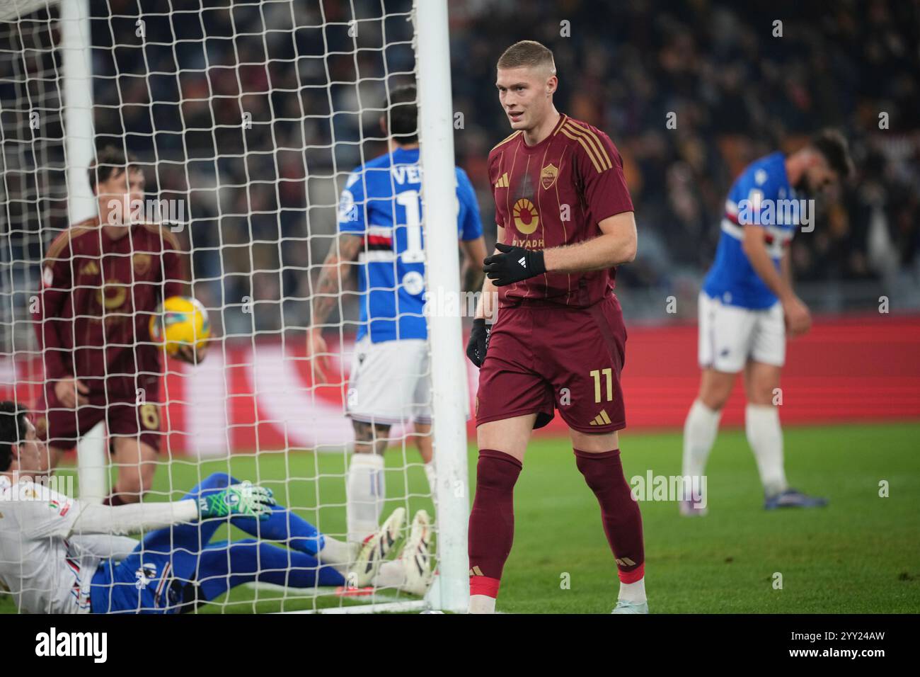 Roma's Artem Dovbyk, centre, celebrates after scoring his side's second ...