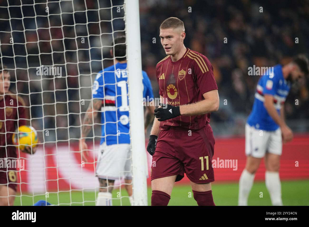 Roma's Artem Dovbyk, centre, celebrates after scoring his side's second ...