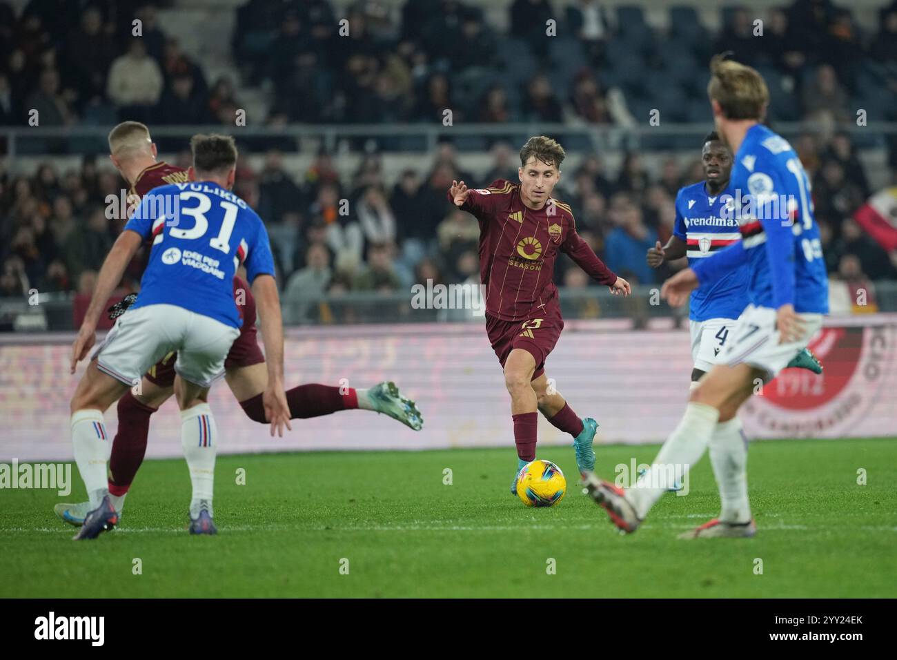 Roma's Tommaso Baldanzi, centre, scores his side's third goal during an ...