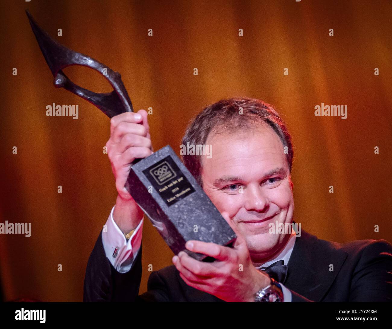 ARNHEM - Rowing coach Eelco Meenhorst on the podium after winning Coach ...