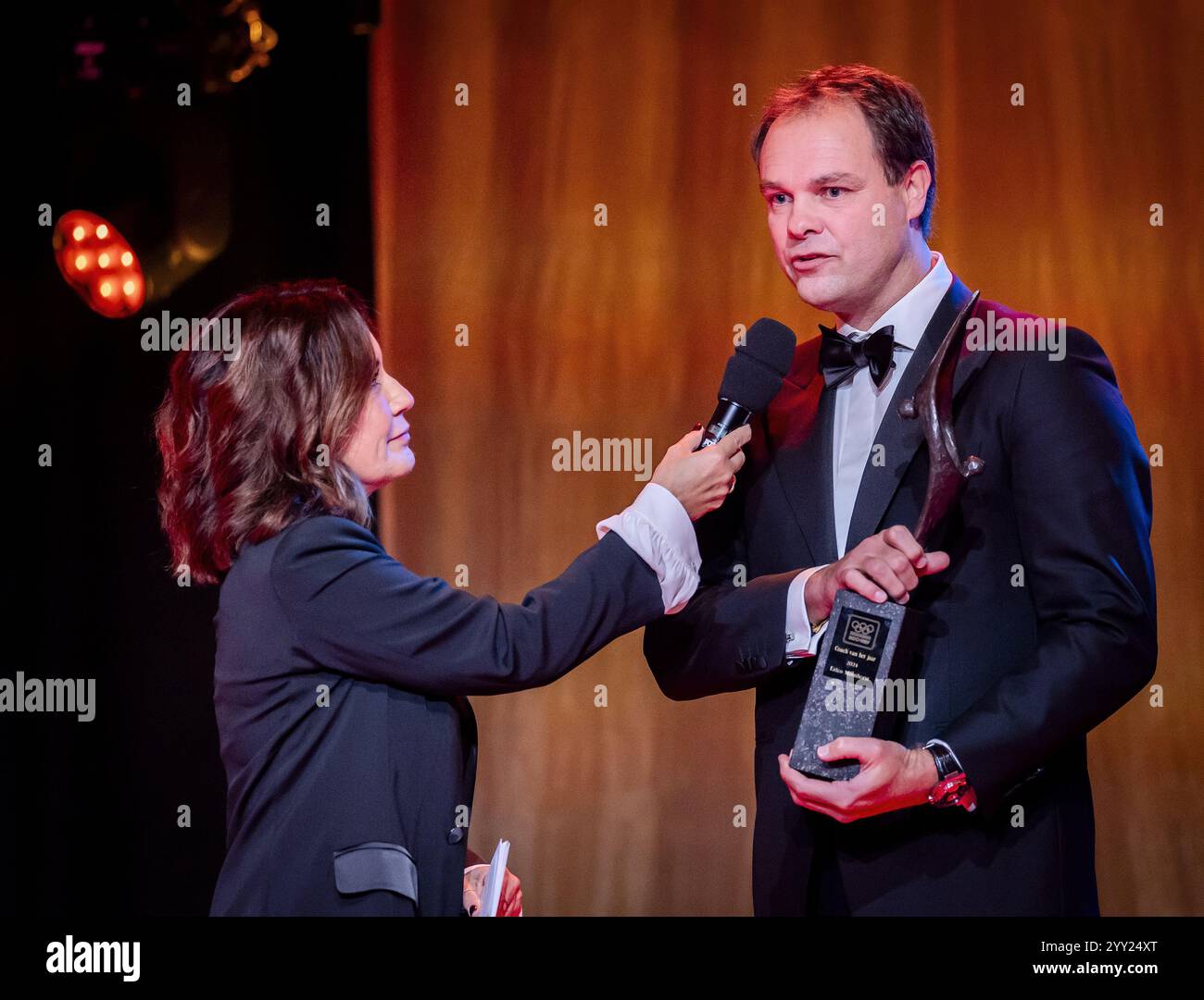 ARNHEM - Rowing coach Eelco Meenhorst on the podium after winning Coach ...